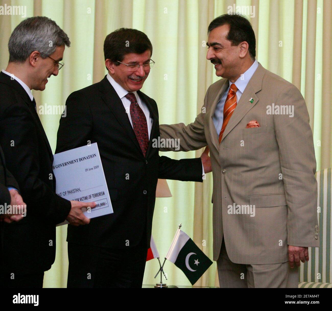 Receiving a cheque for a hi-res stock photography and images - Alamy