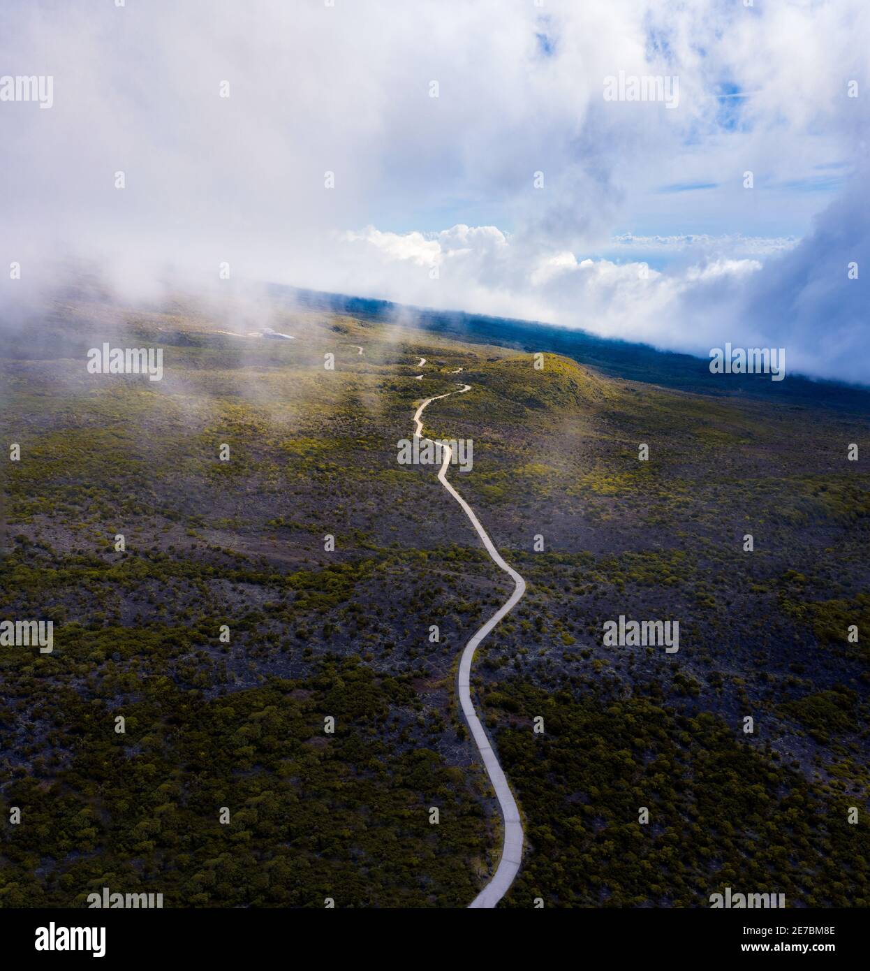 Aerial view of a long narrow road between fields Stock Photo - Alamy