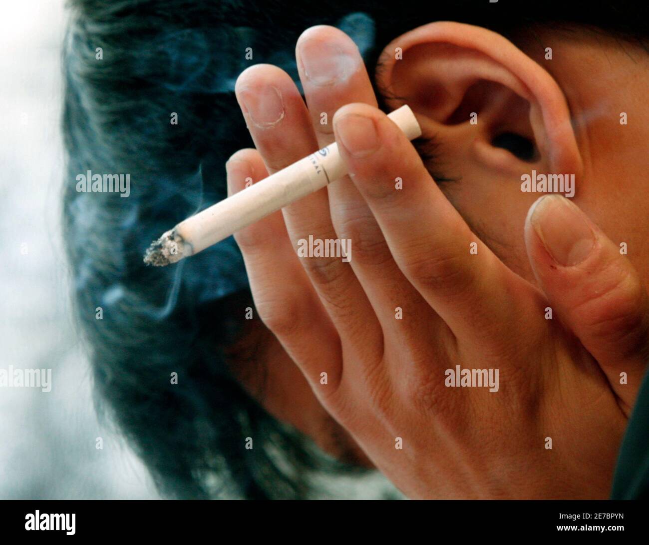 Japanese man smoking cigarette hi-res stock photography and images - Alamy