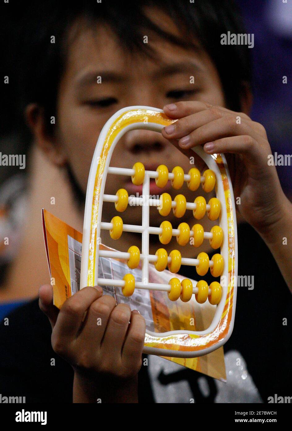 Abacus china boy hi-res stock photography and images - Alamy