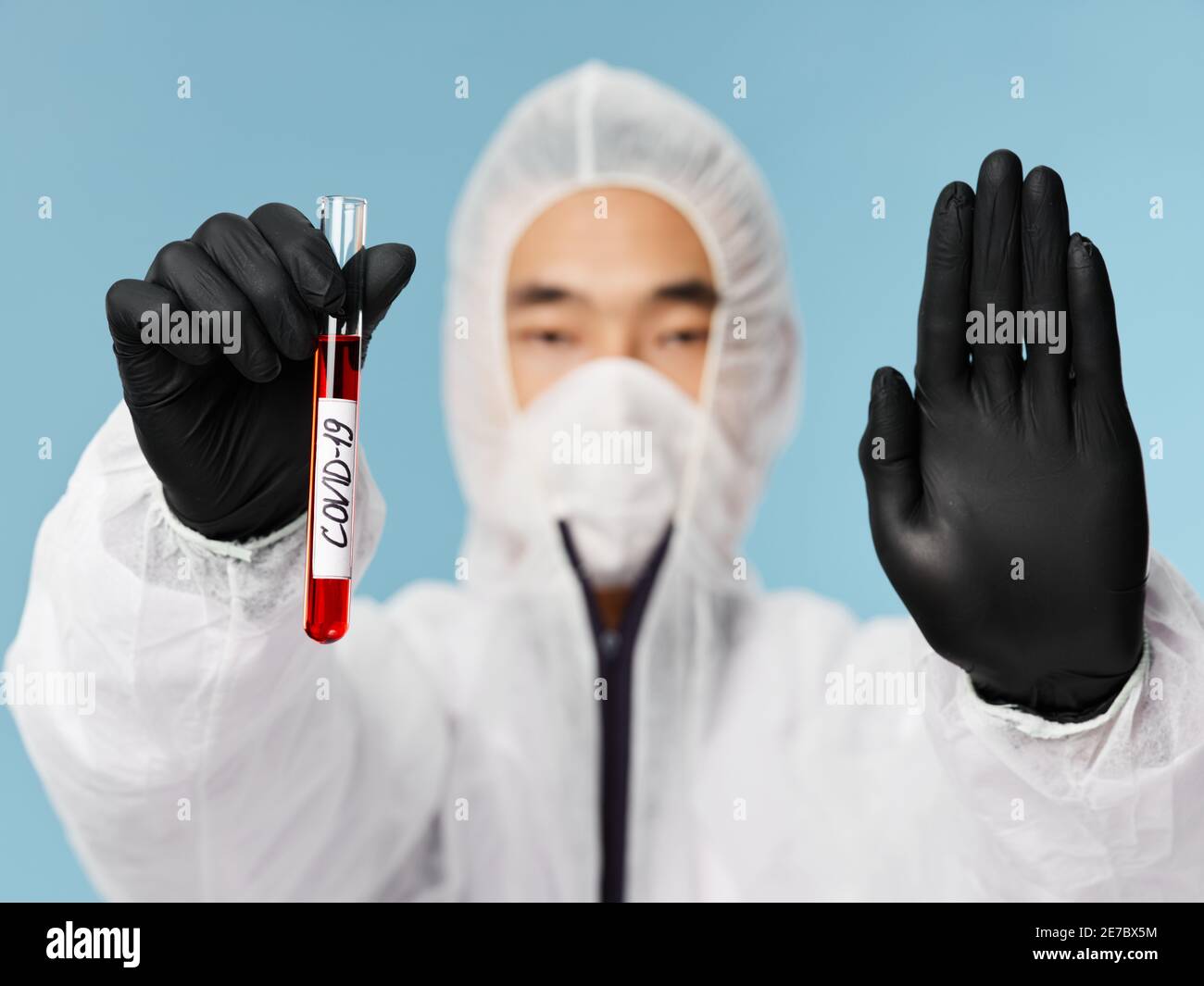 Male laboratory assistant black gloves blood test biochemistry blue ...