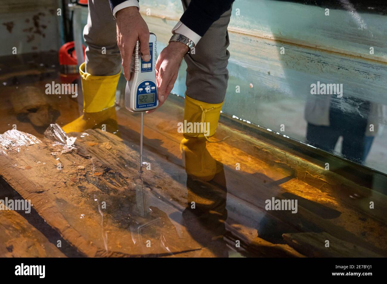 Detail of a hands man using a sclerometer to measure the hardness of ...