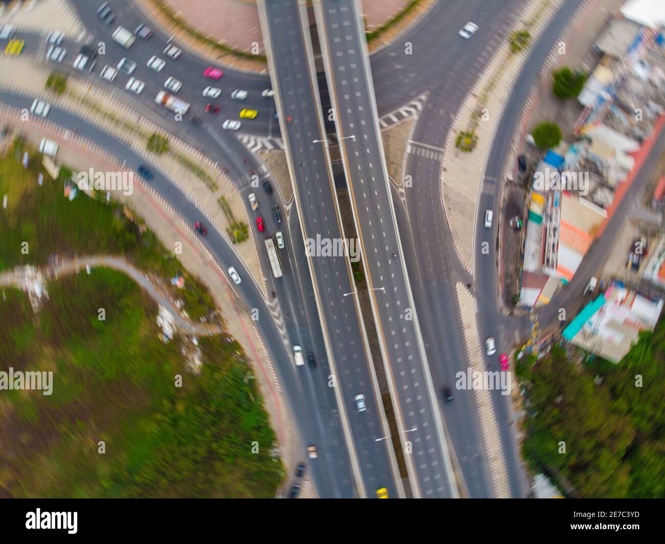 Circular junction cross transport road with car movement aerial view ...
