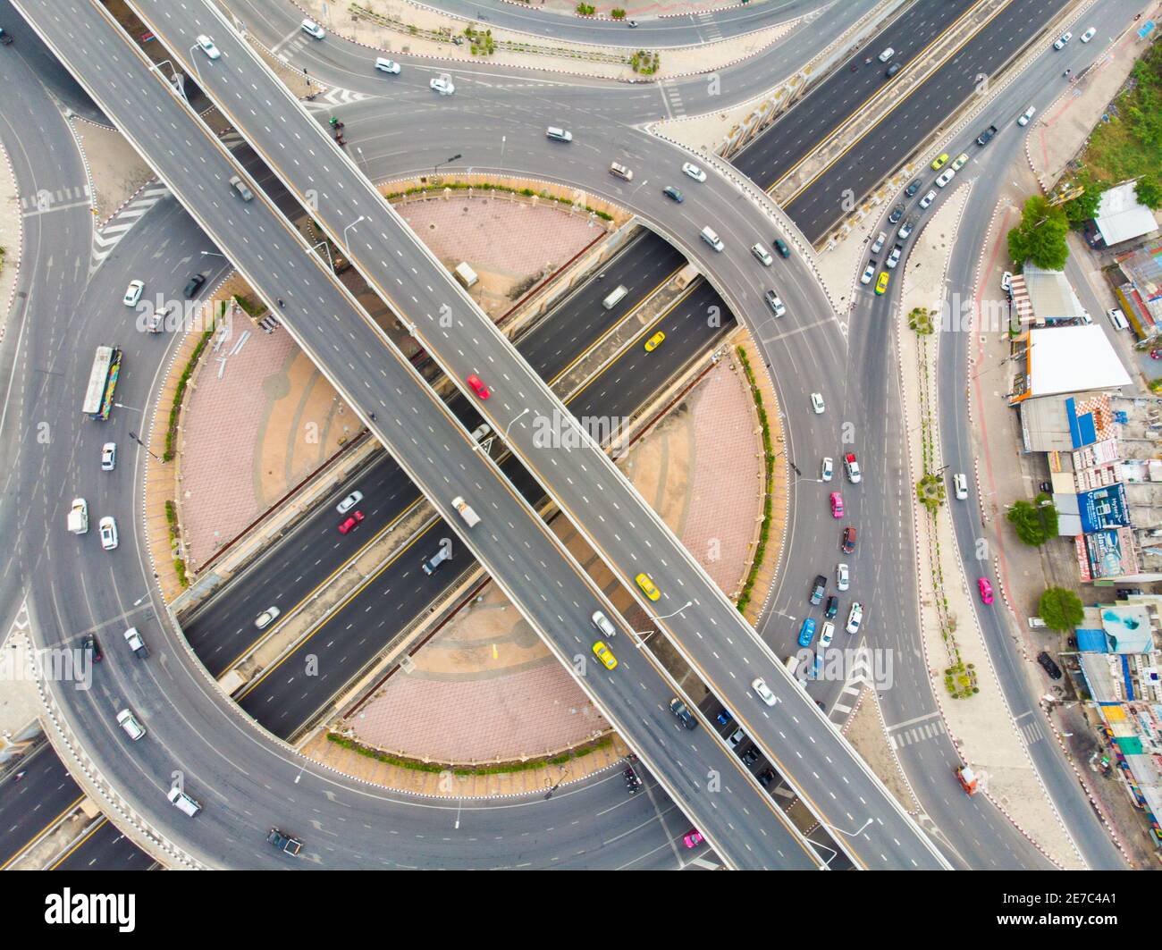 Circular junction cross transport road with car movement aerial view ...