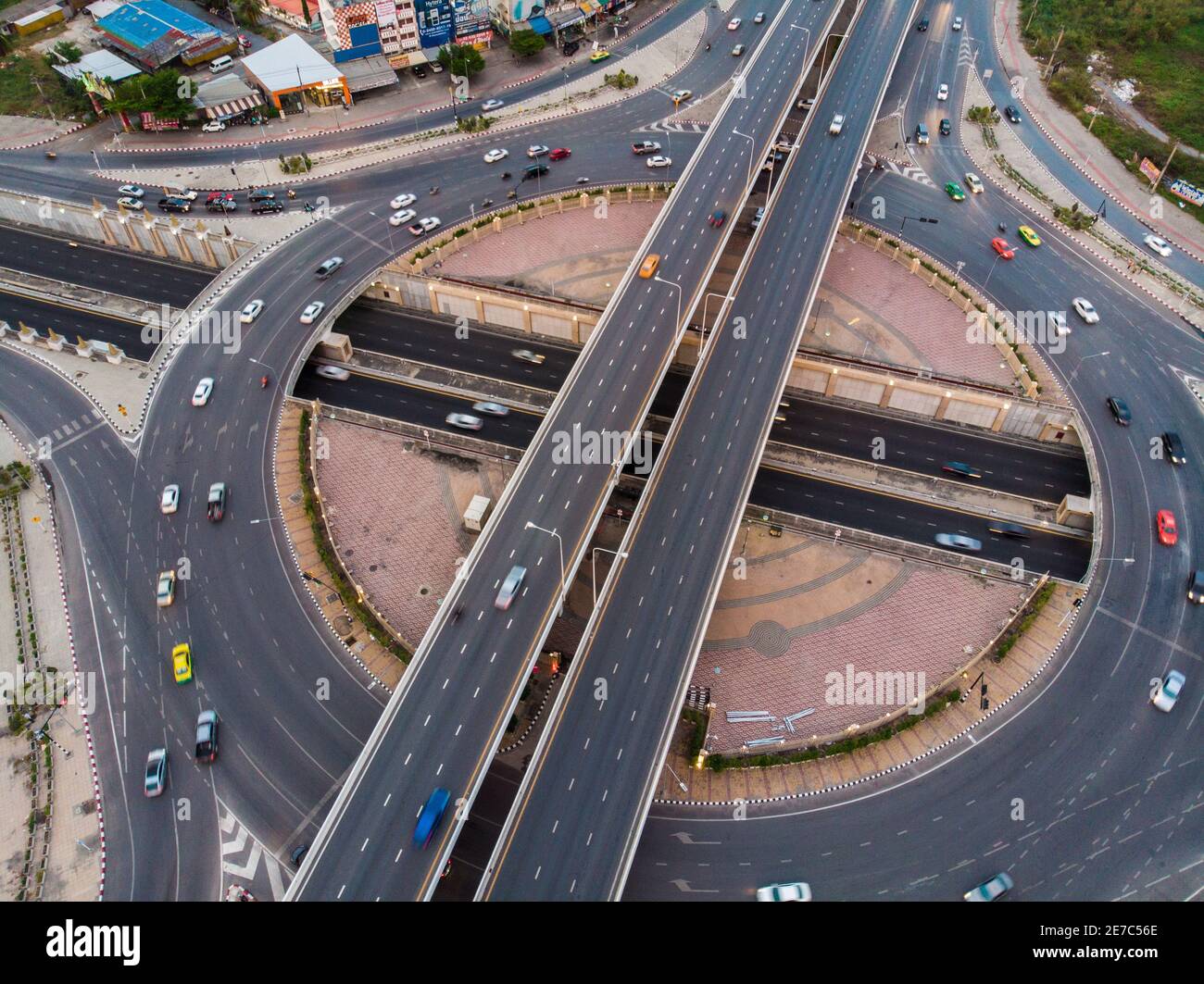 Circular junction cross transport road with car movement aerial view ...