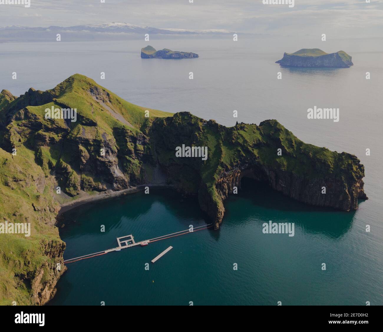 An aerial view of a cliff in the calm water of a sea Stock Photo - Alamy