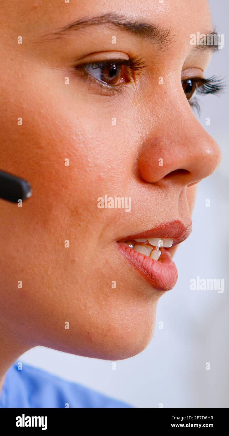 Female physician in headset consulting hi-res stock photography and ...
