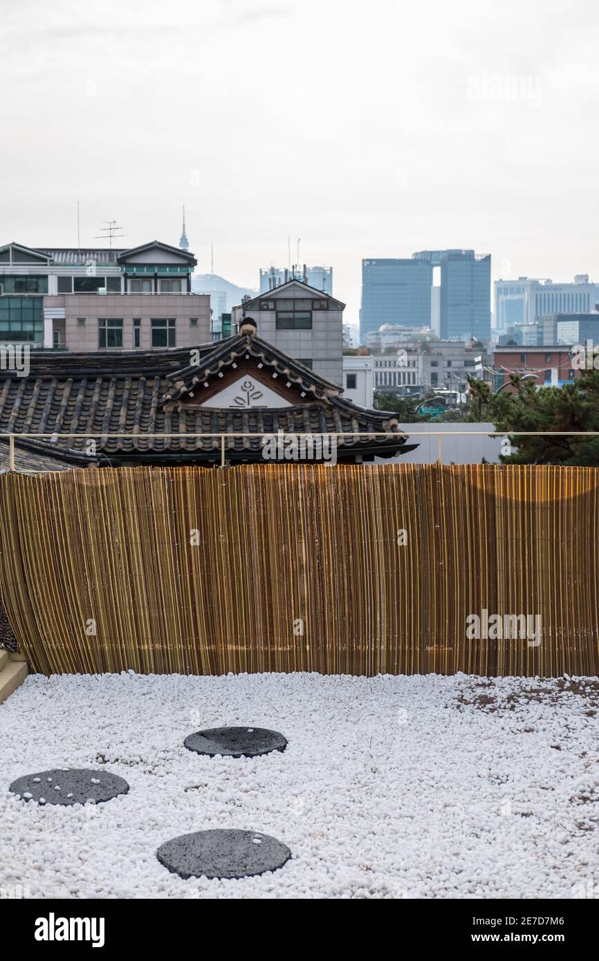 Rooftop with pebble stone garden with background of Korean traditional ...