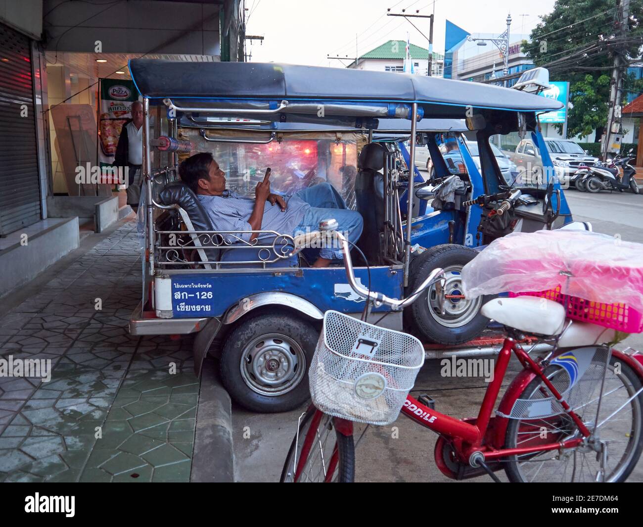 Tuk tuk taxi waiting by the road hi-res stock photography and images ...