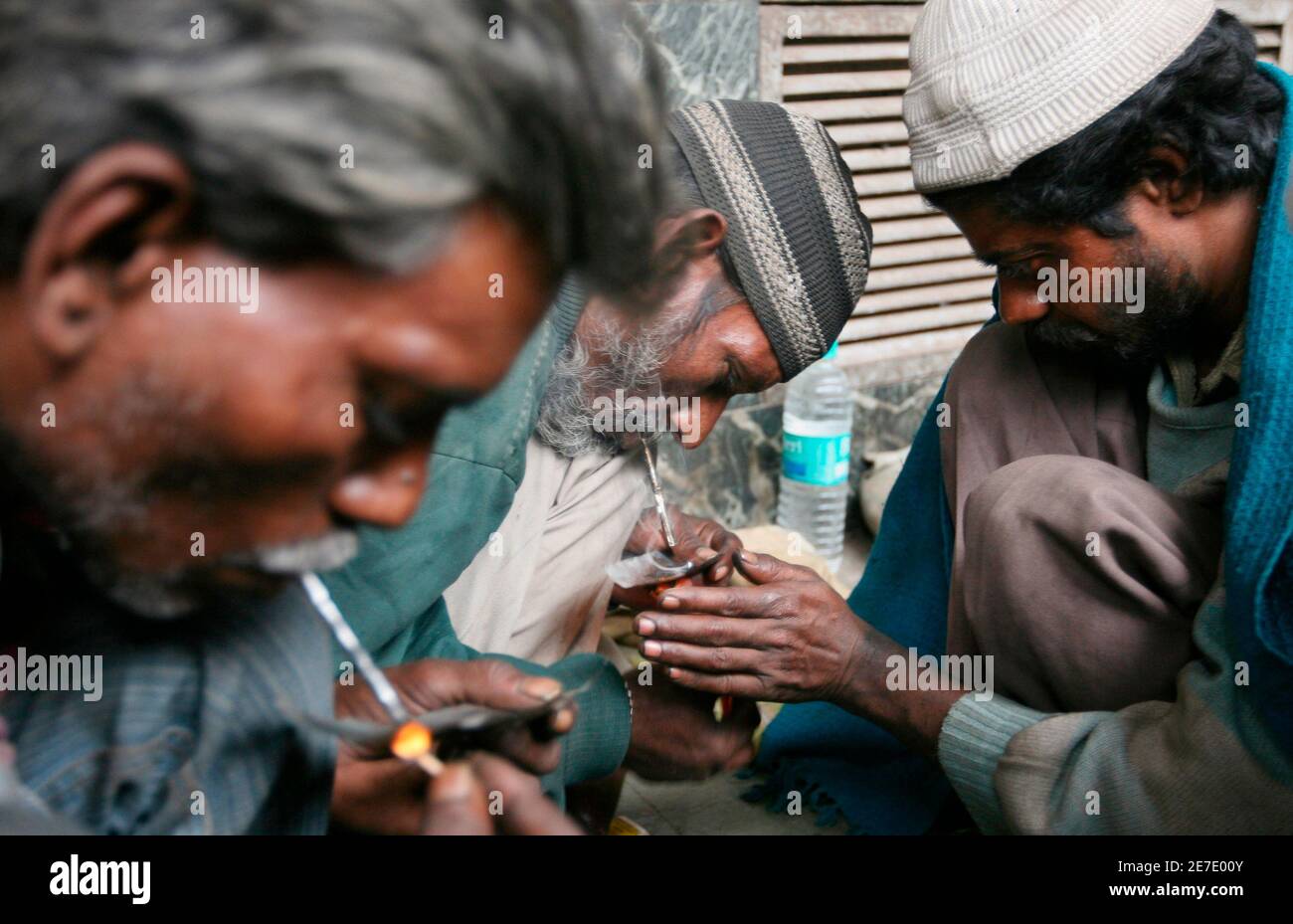 Drug addicts smoke heroin in hi-res stock photography and images - Alamy