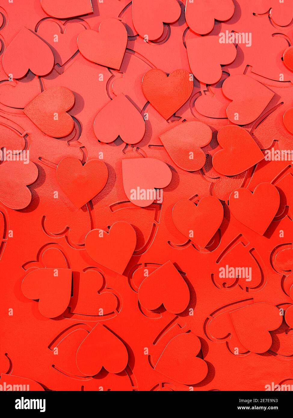 Red metal hearts in sunlight, installation of the symbol of love Stock ...