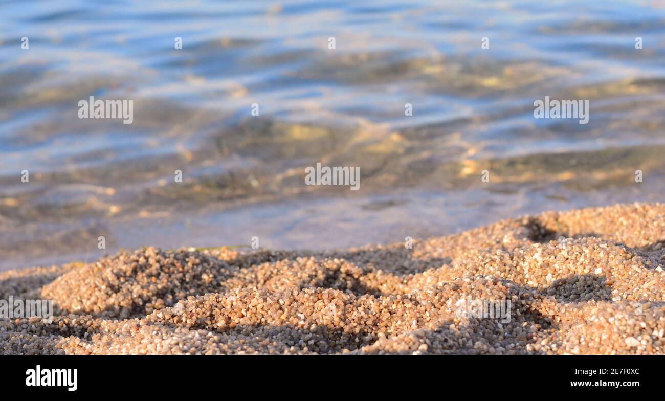 Golden Sand on the beach as background. Sand Texture. Golden sand ...
