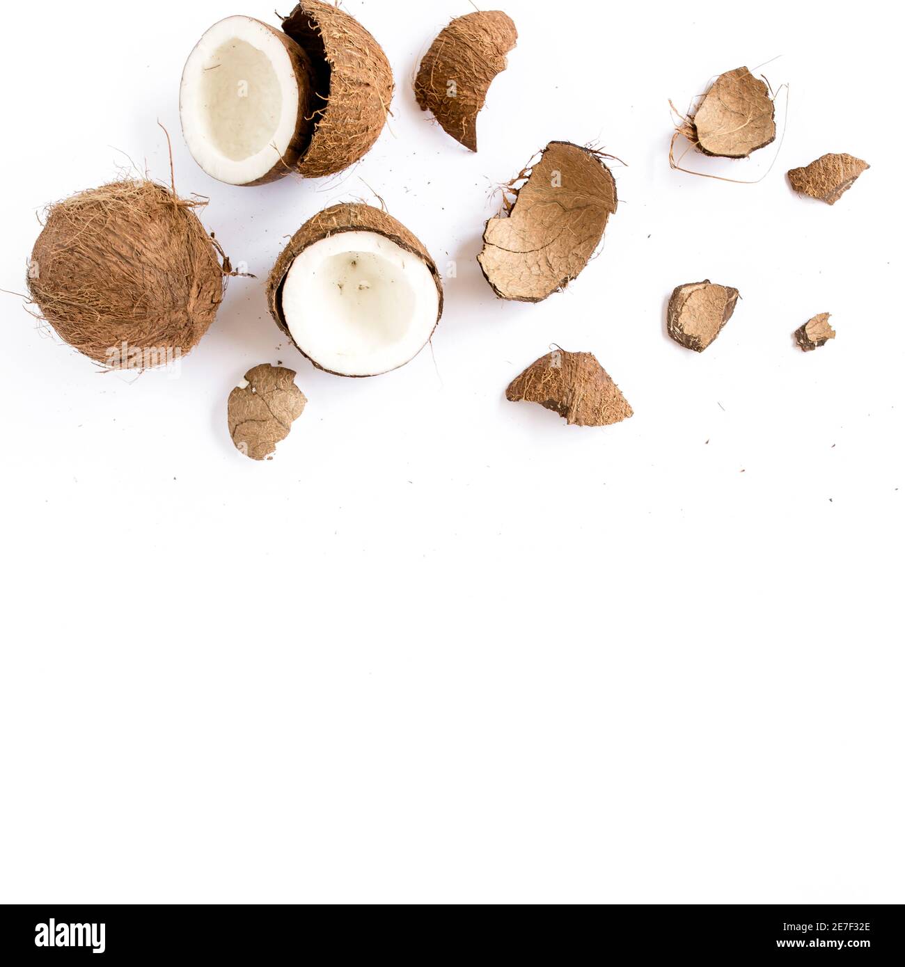 cracked coconut on white background. flat lat, top view Stock Photo - Alamy