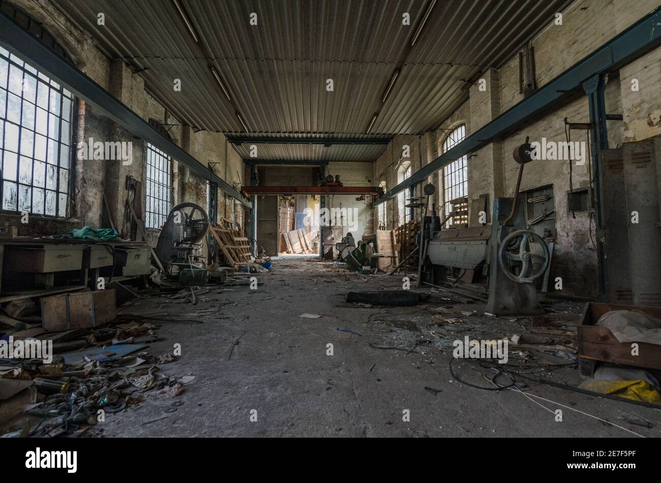 old machine hall in an abandoned workshop Stock Photo - Alamy