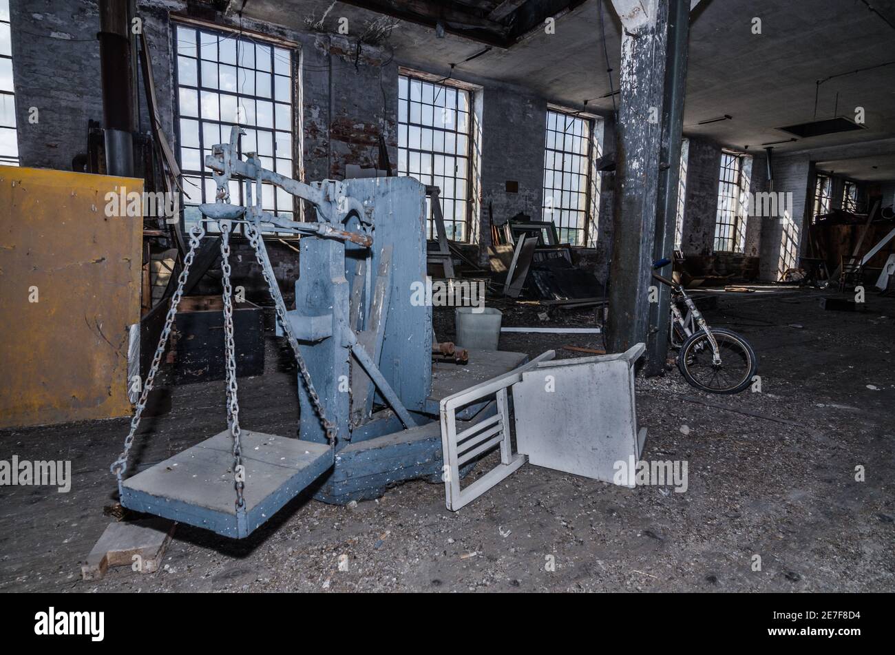 blue old libra in an abandoned factory Stock Photo - Alamy