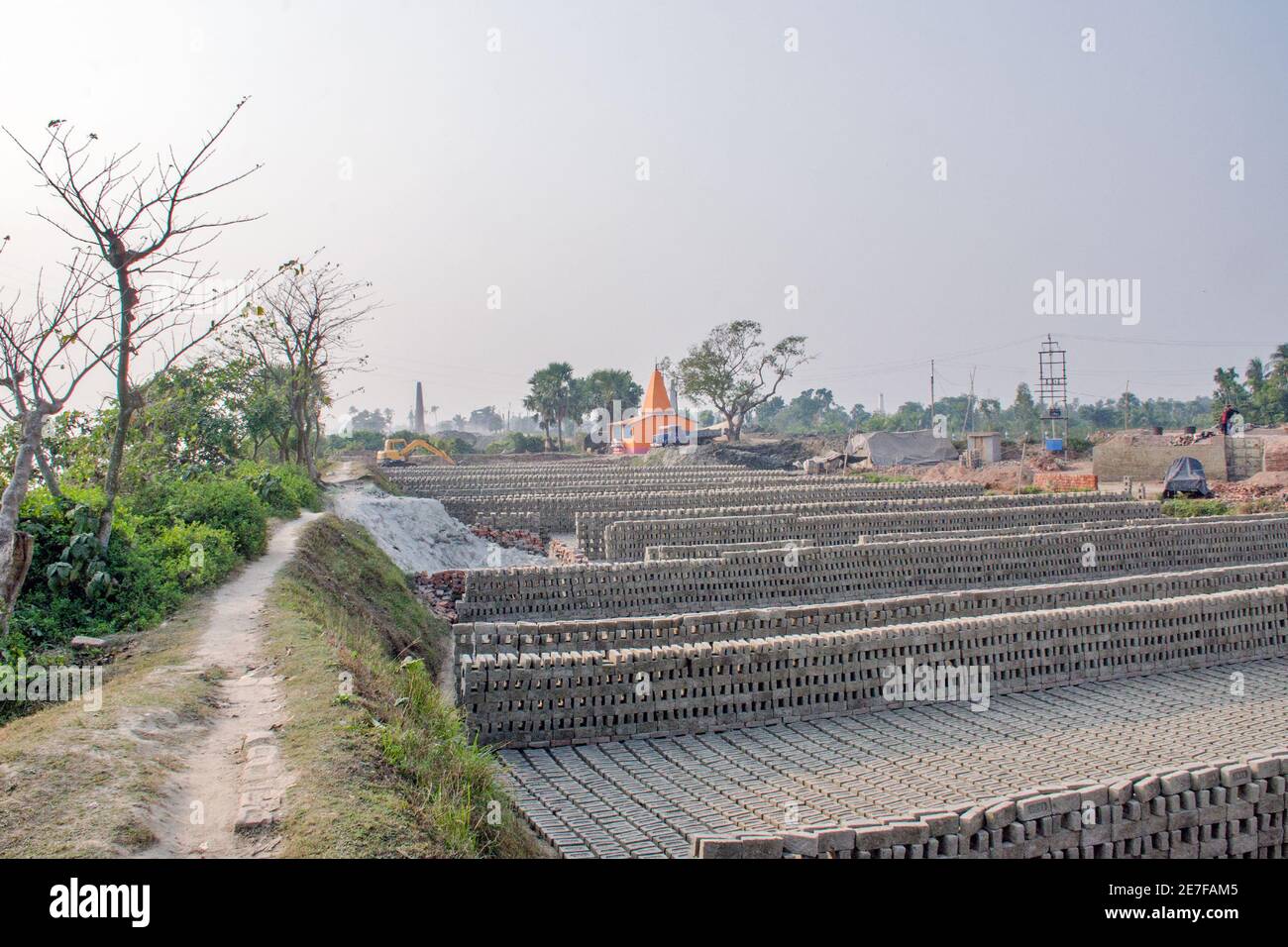 Pictures of brick kilns in rural Bengal where work is in full swing. A ...