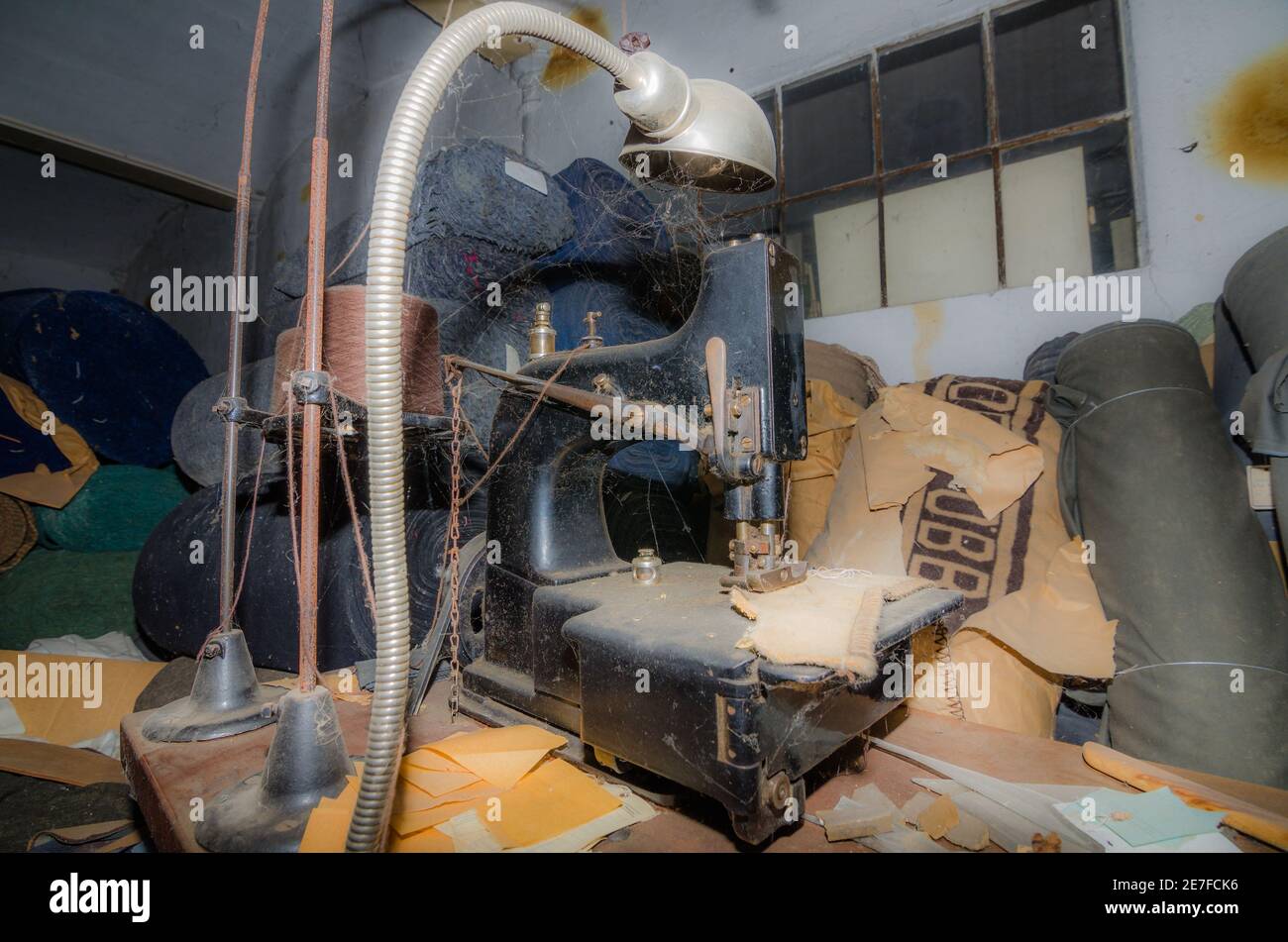 old sewing machine with lamp in a factory Stock Photo - Alamy