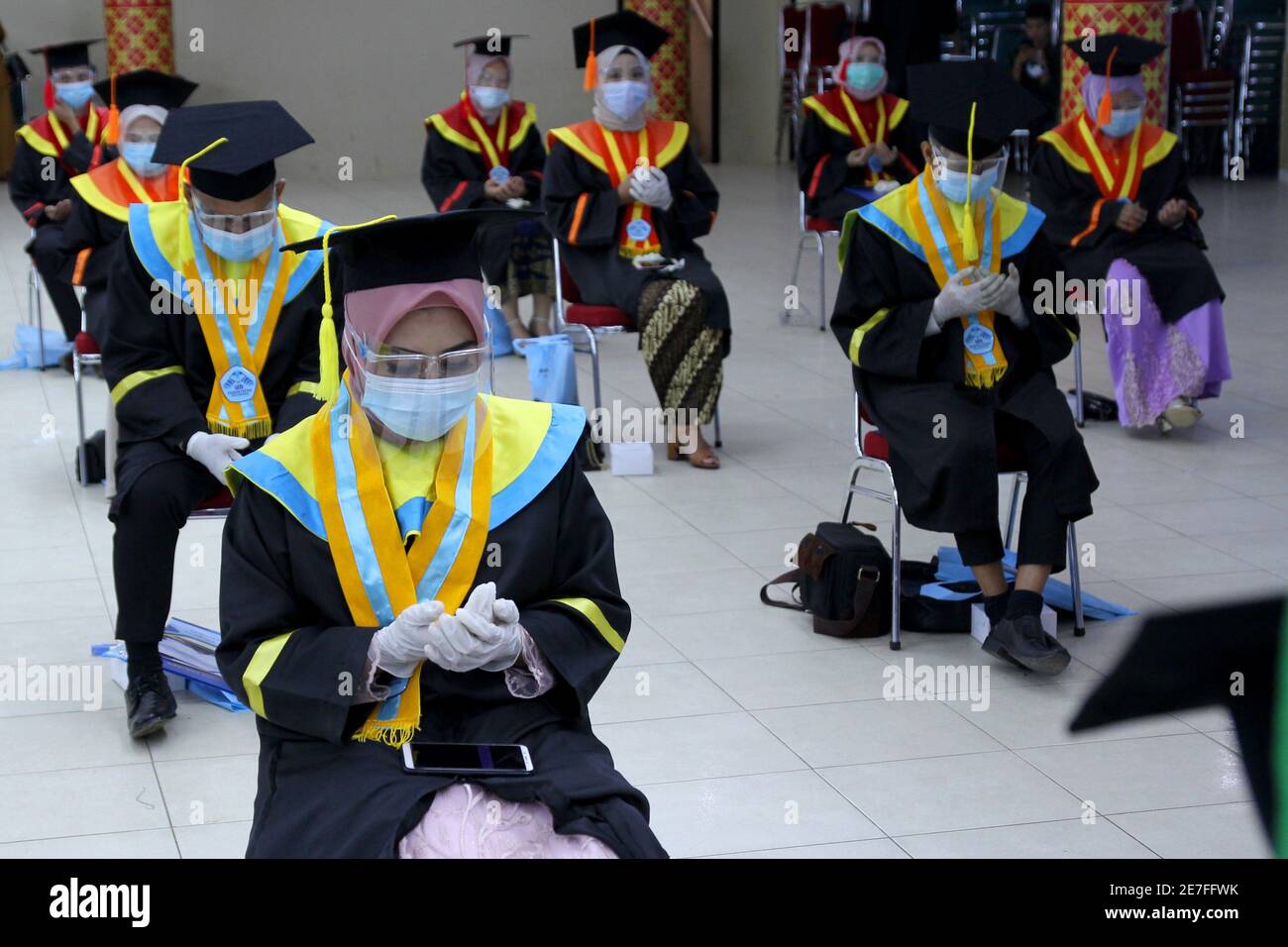 Palembang, Indonesia. 30th Jan, 2021. Students pray at the end of the ...