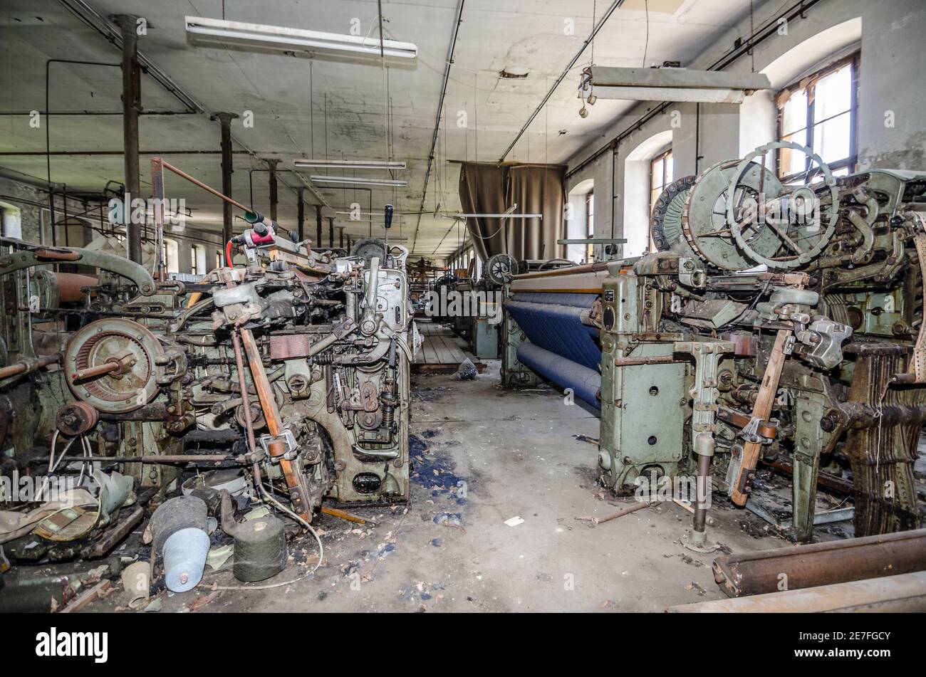 many old machines in a textile factory Stock Photo - Alamy