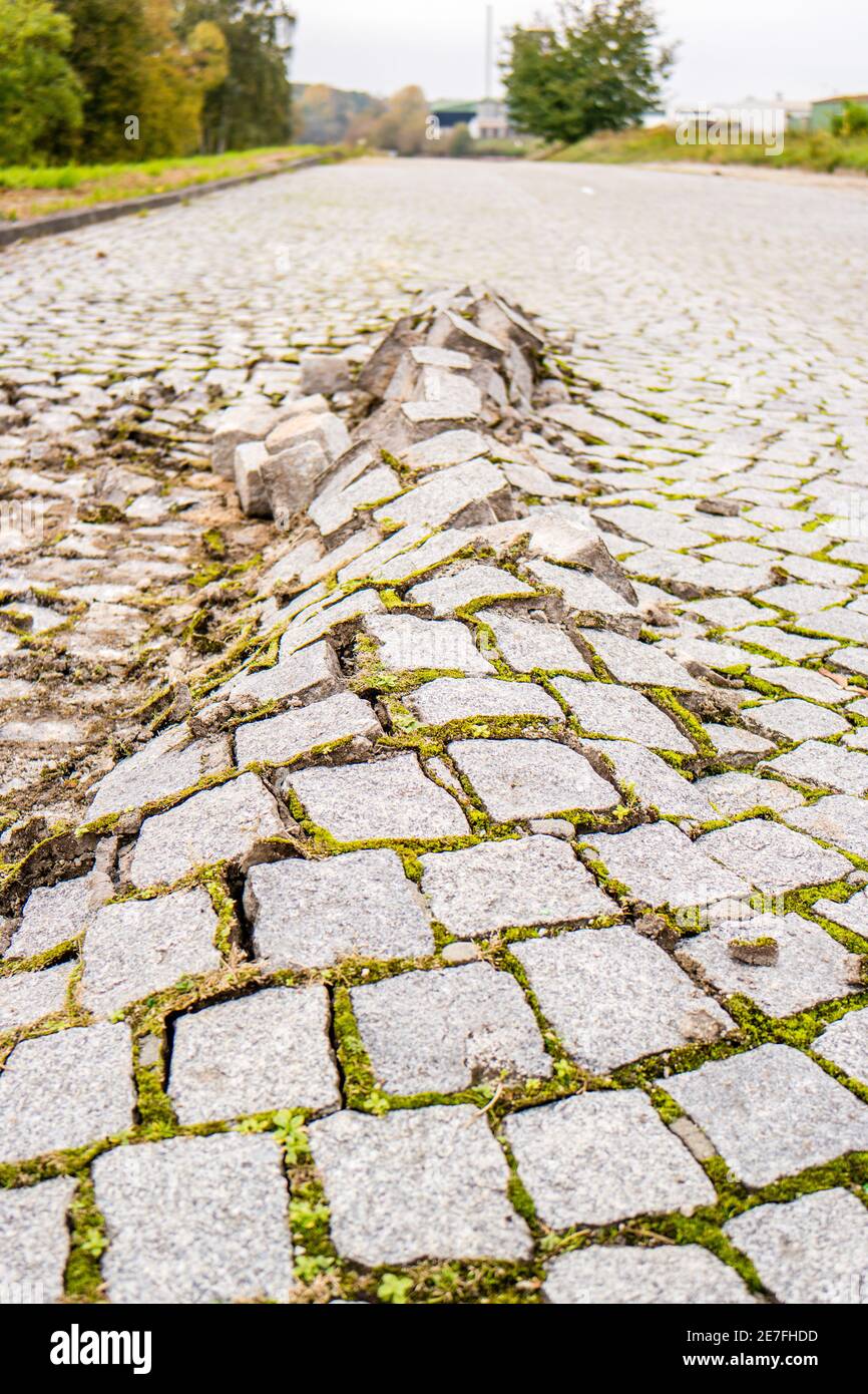 The floor of the footpath is broken Stock Photo - Alamy