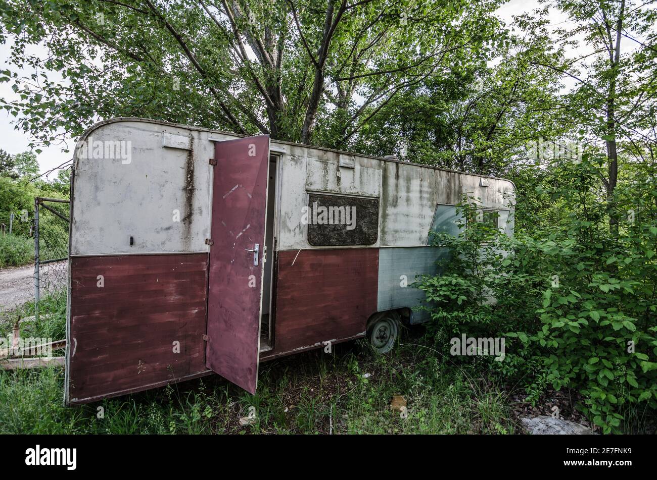 old abandoned caravan in nature Stock Photo - Alamy