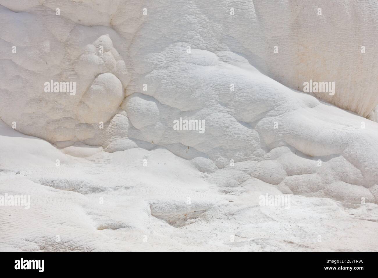 Details of white carbonate mineral rocks made by water flow at ...