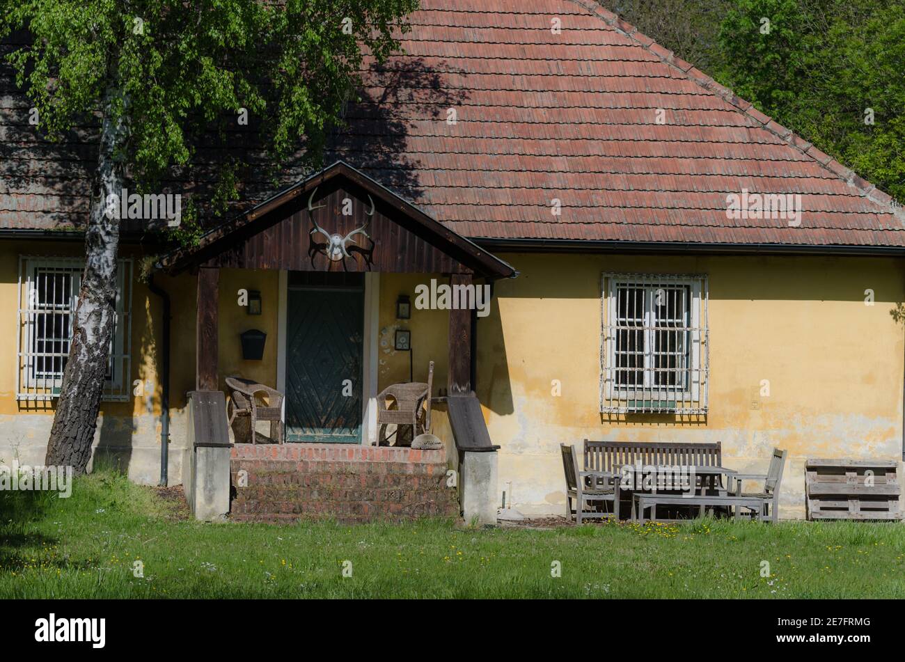 old hunter house in forest Stock Photo - Alamy