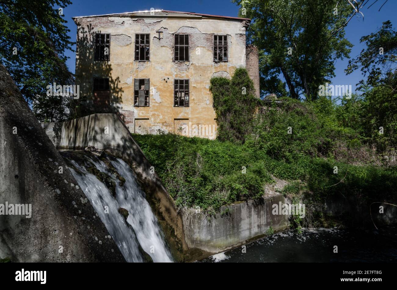 old factory with waterfall in nature Stock Photo - Alamy