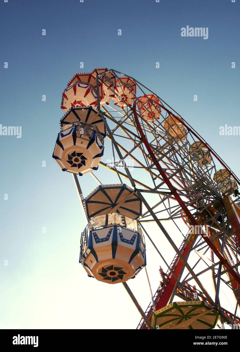 Colorful Ferris wheel in the amusement park Stock Photo - Alamy