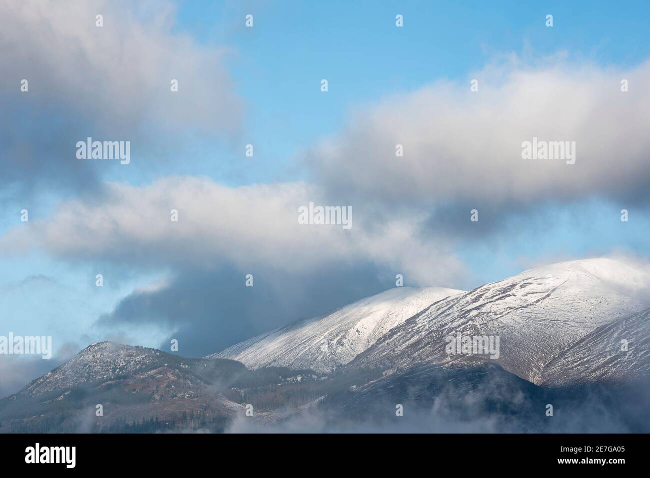 Stunning landscape image of Skiddaw snow capped mountain range in Lake ...