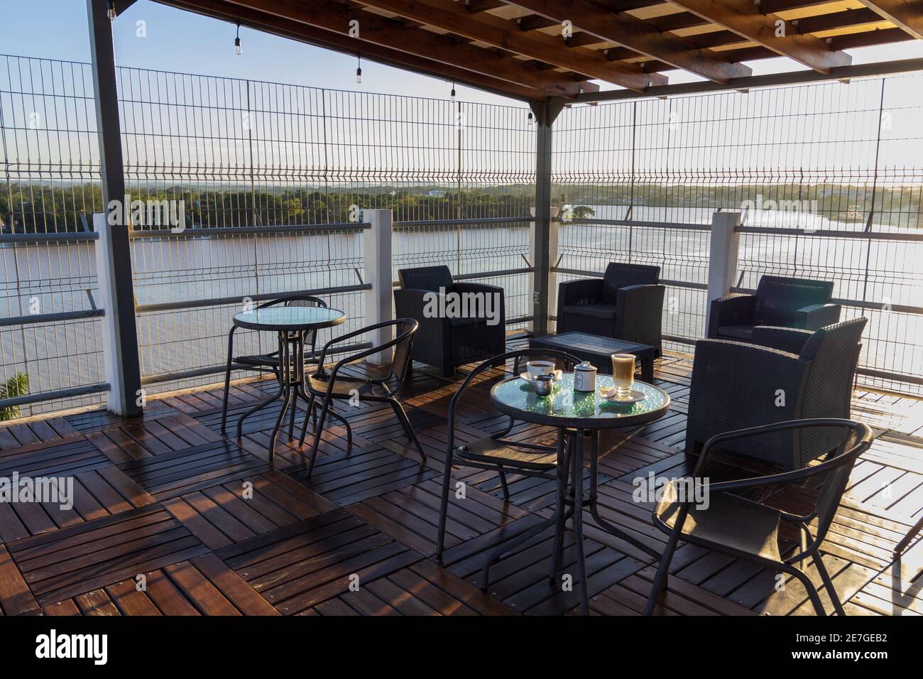 Empty cafe with two coffee cups Stock Photo - Alamy