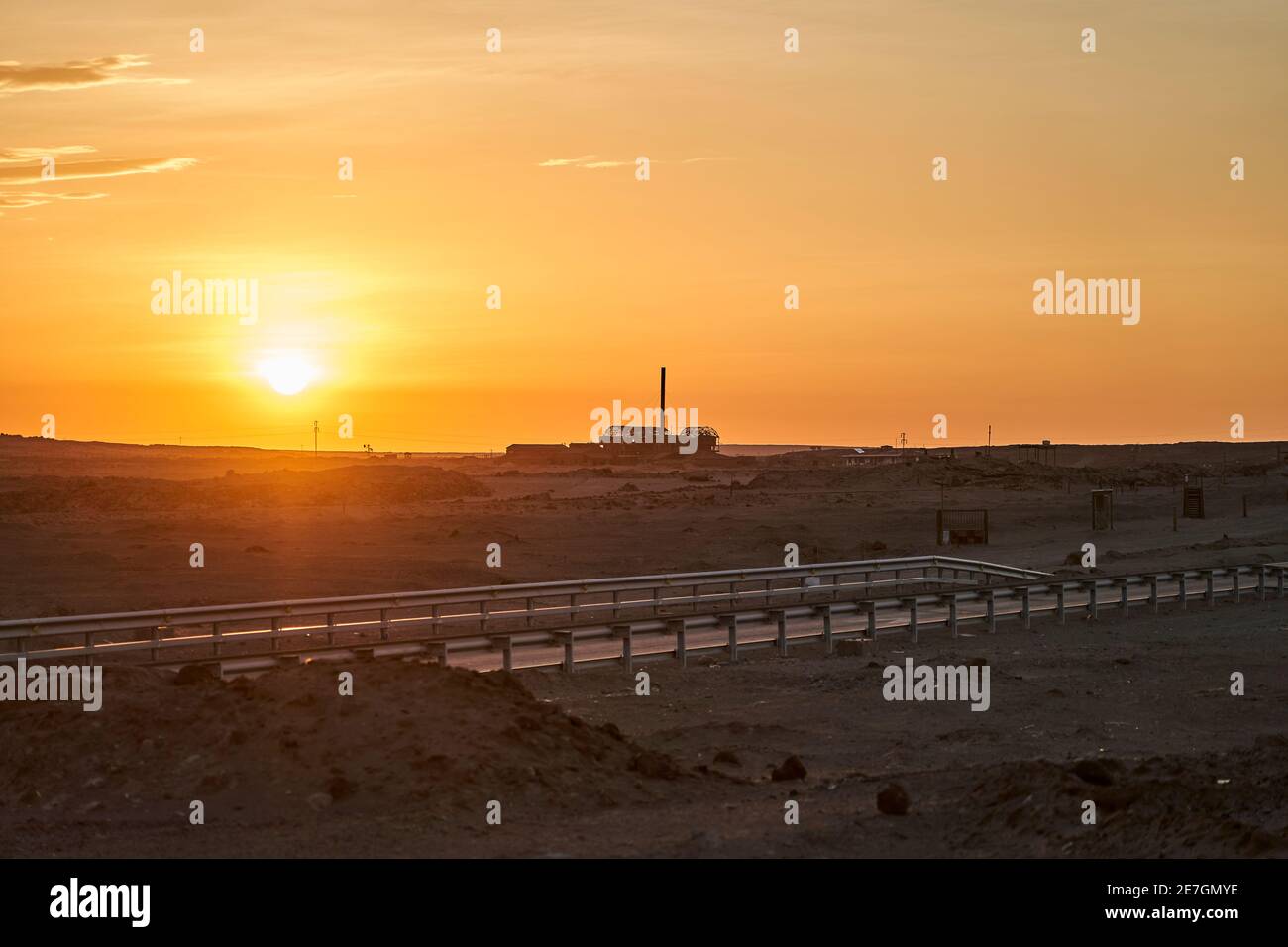 romantic sunset over an old saltpeter mining town in the Atacama desert ...