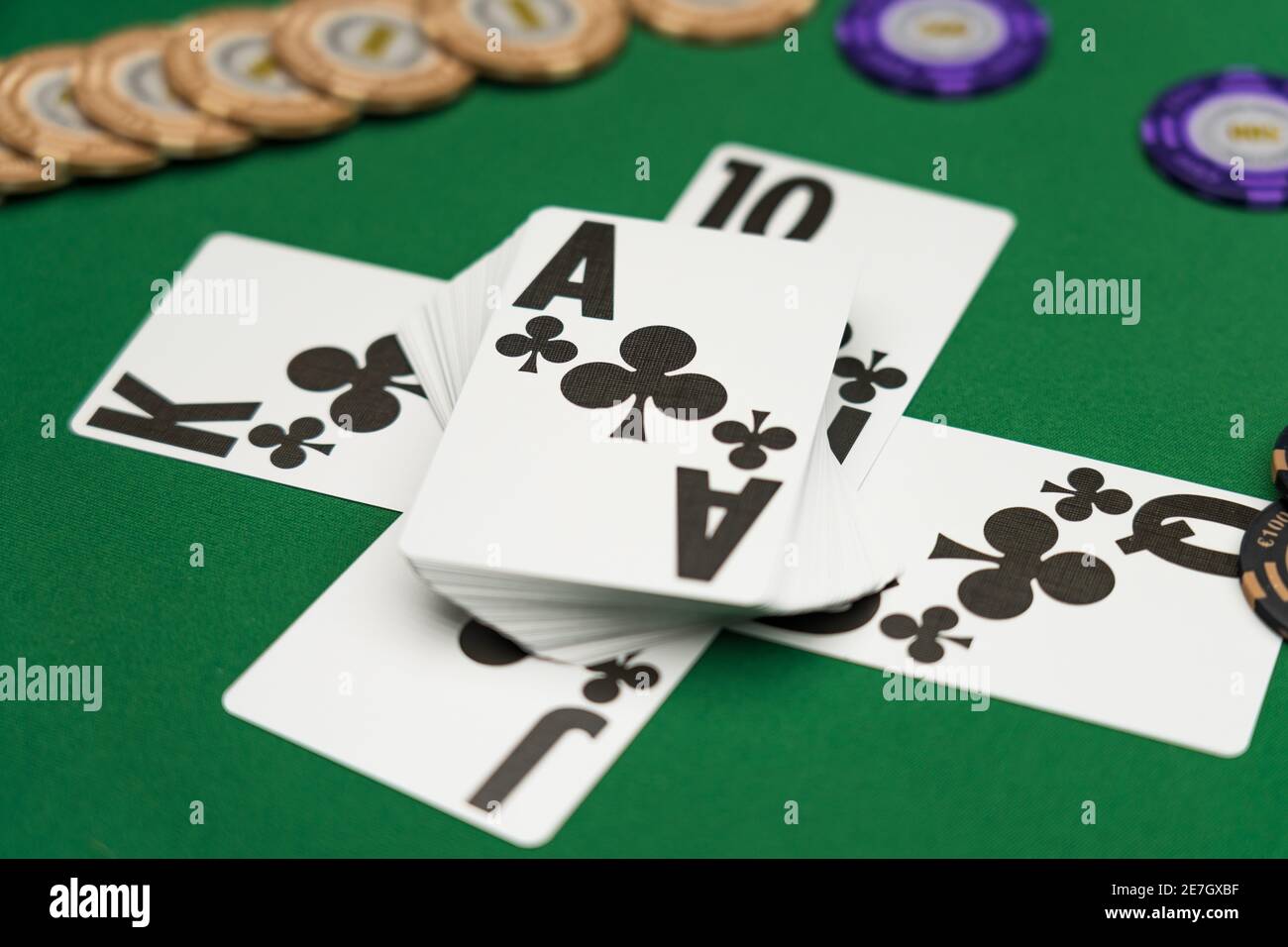 Poker game Clubs royal flush Stock Photo - Alamy