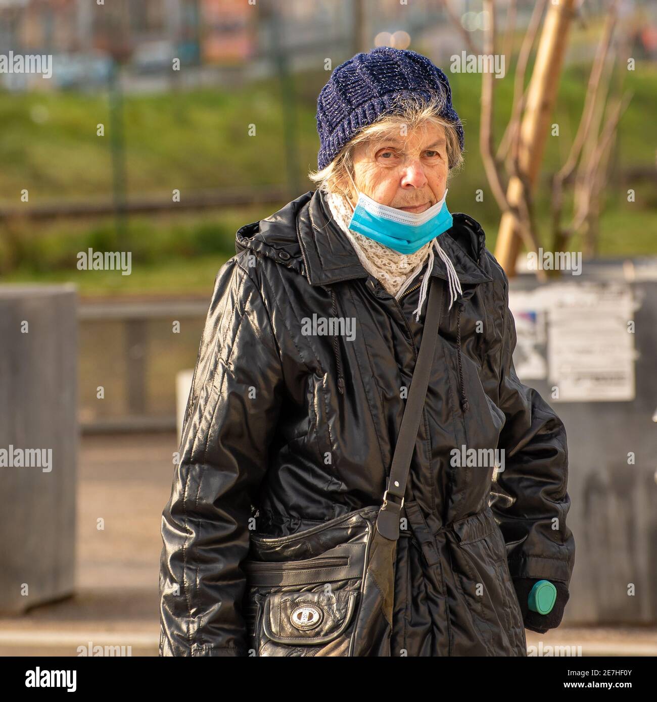 Prague, Czech Republic. 01-29-2021. Portrait of an old woman walking in ...