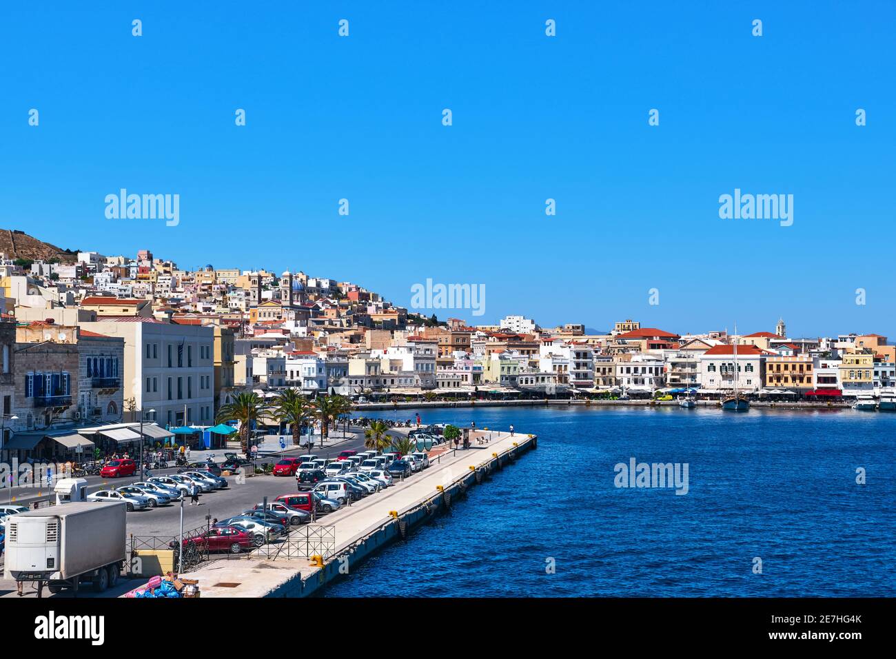 Port of Ermoupoli on Syros island, Greece and harbor. Colorful houses ...