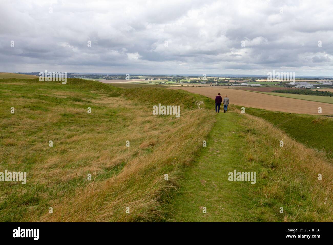 VIew along one of the earth mound edges of Barbury Castle, a scheduled ...