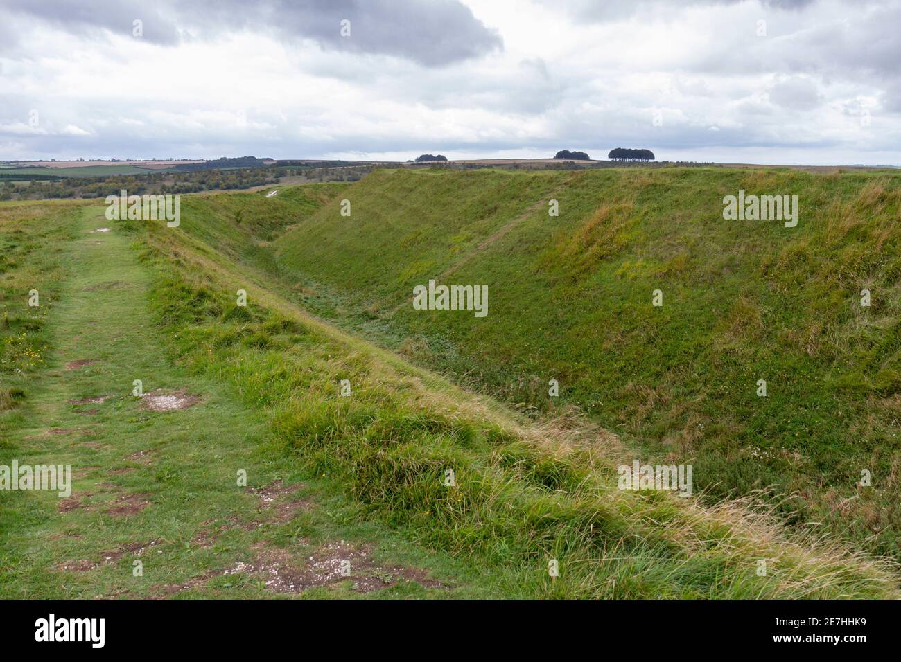 VIew along one of the earth mound edges of Barbury Castle, a scheduled ...