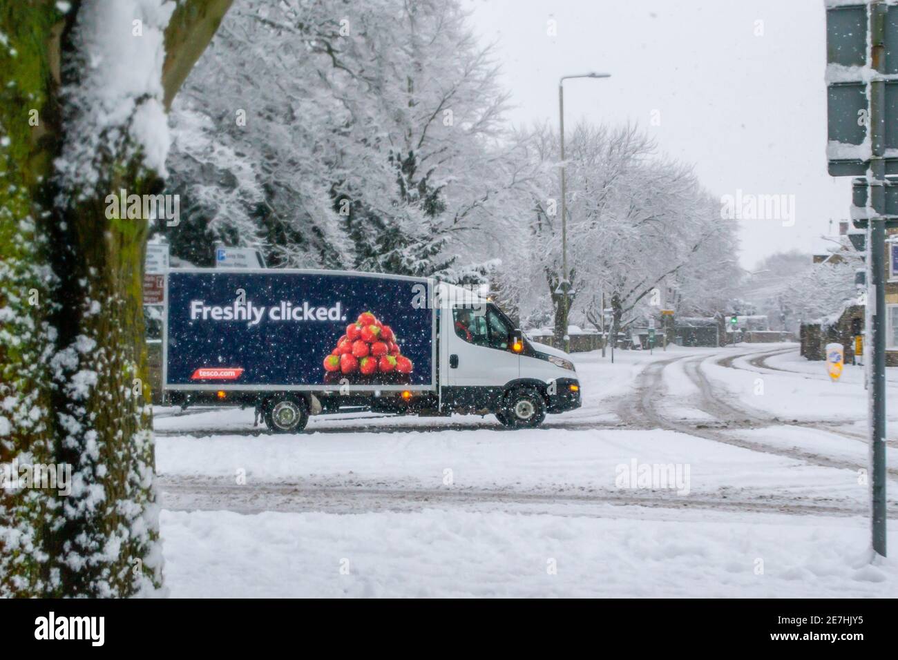 OAKHAM, RUTLAND, ENGLAND- 24 JANUARY 2021: Tesco delivery driver ...