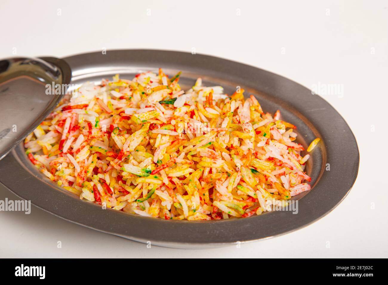 Basmati rice cooked with spices and vegetables isolated on white ...