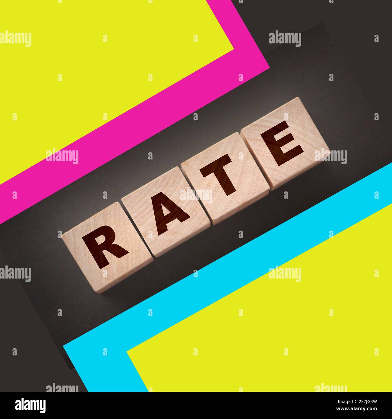 Rate word concept written on wooden cubes blocks lying on a black ...