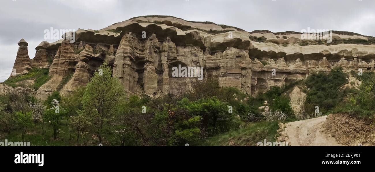 Panorama with magnificent stone structures and caves near Goreme at ...