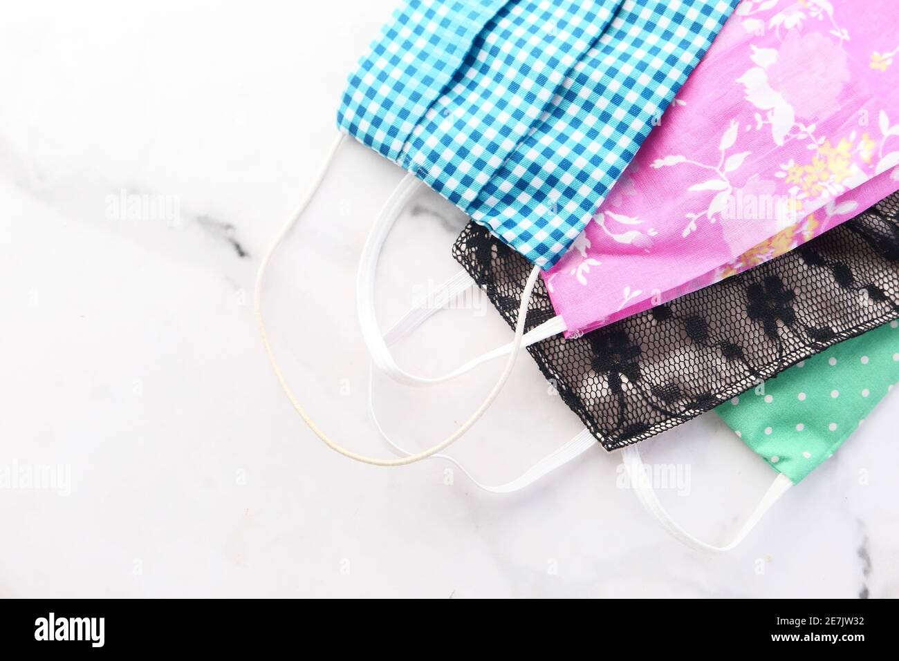 homemade face masks on tiles background top down Stock Photo - Alamy