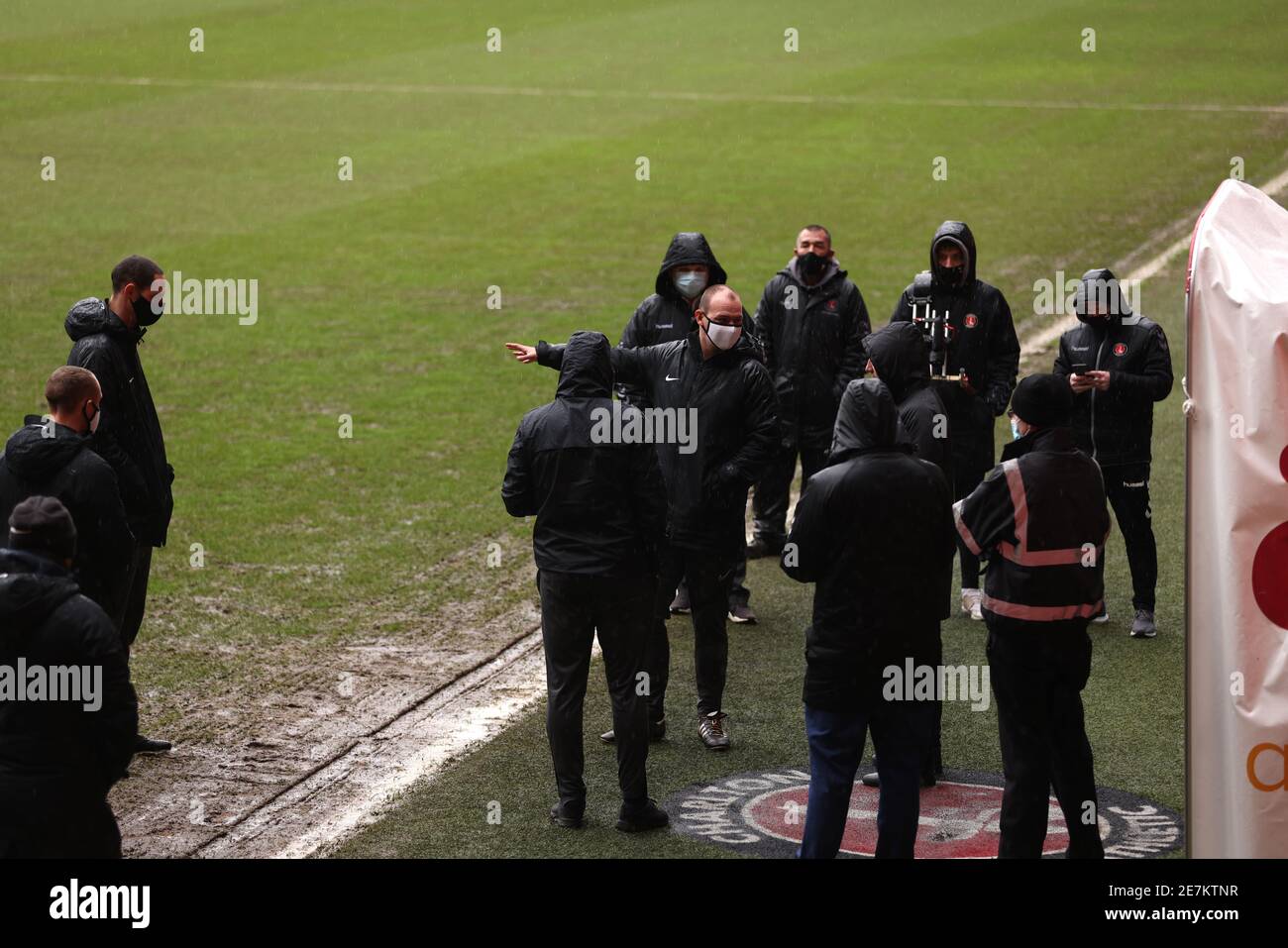 Referee does pitch inspection hi-res stock photography and images - Alamy