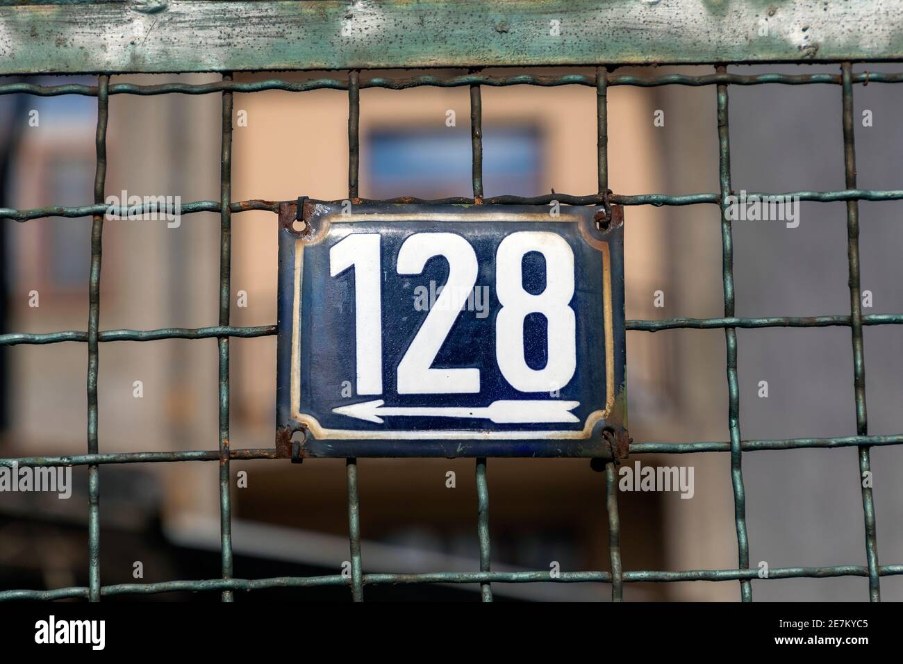 Number 128, the number of houses, apartments, streets. The white number ...