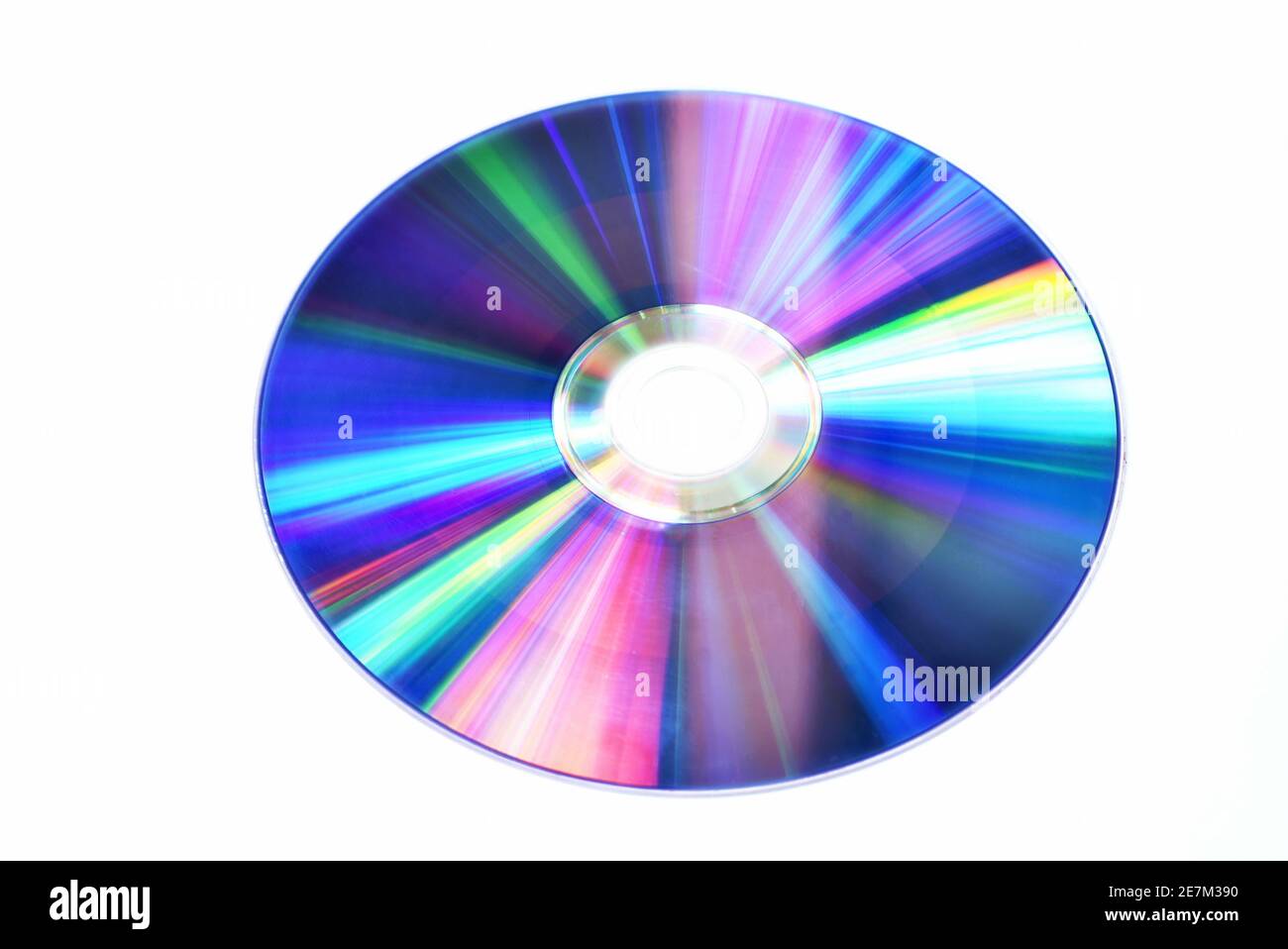 CD or DVD with colorful light reflection on surface in white background ...