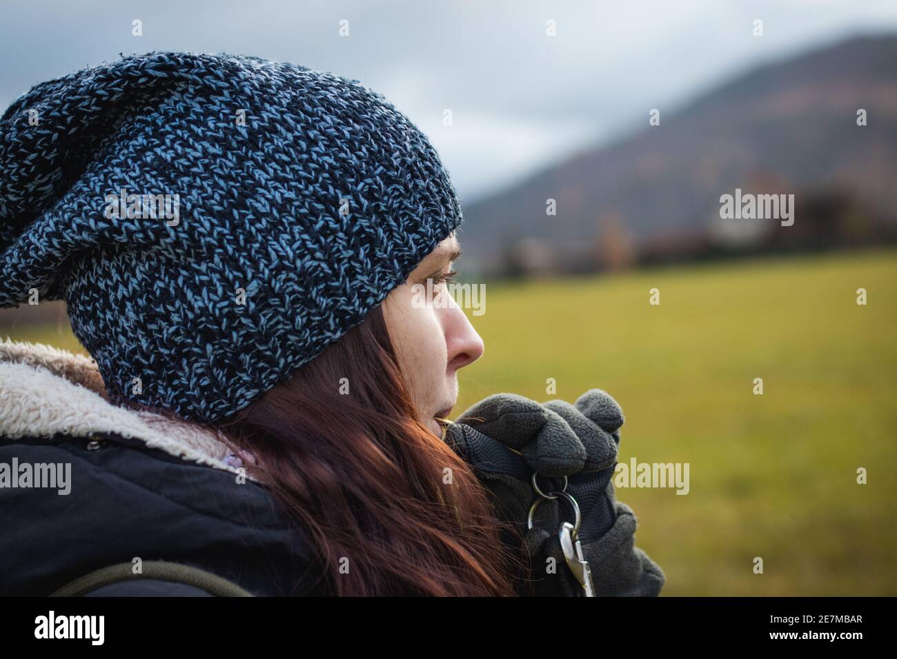 detailed shot of the face of a young female dog breeder, a Czech ...