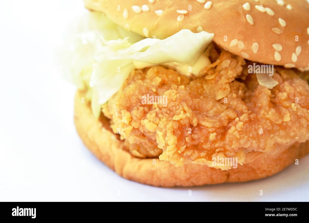 crispy fried chicken hamburger dressing cheese sauce on white ...