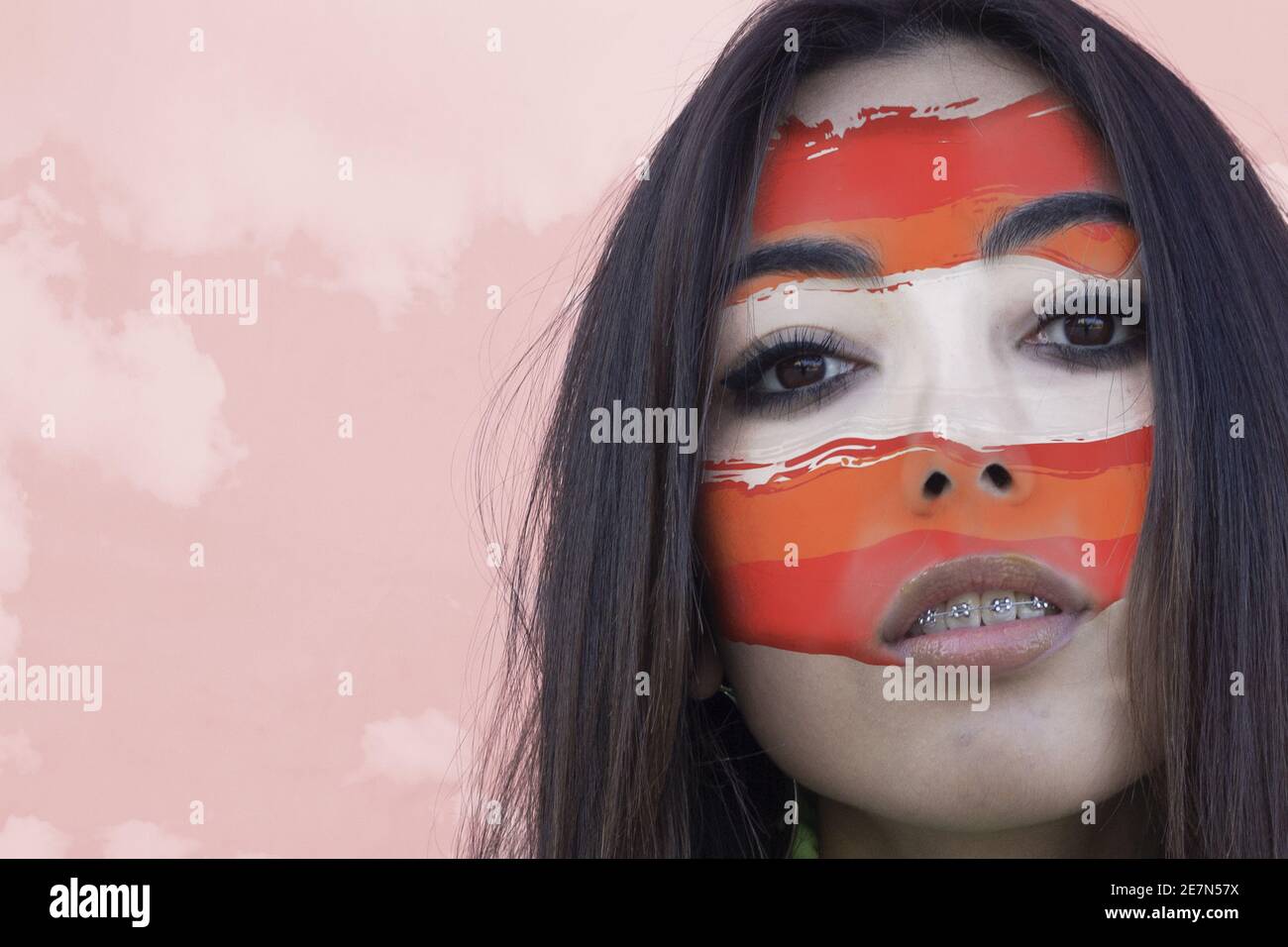 Flag of Austria painted on a face of a young female Stock Photo - Alamy