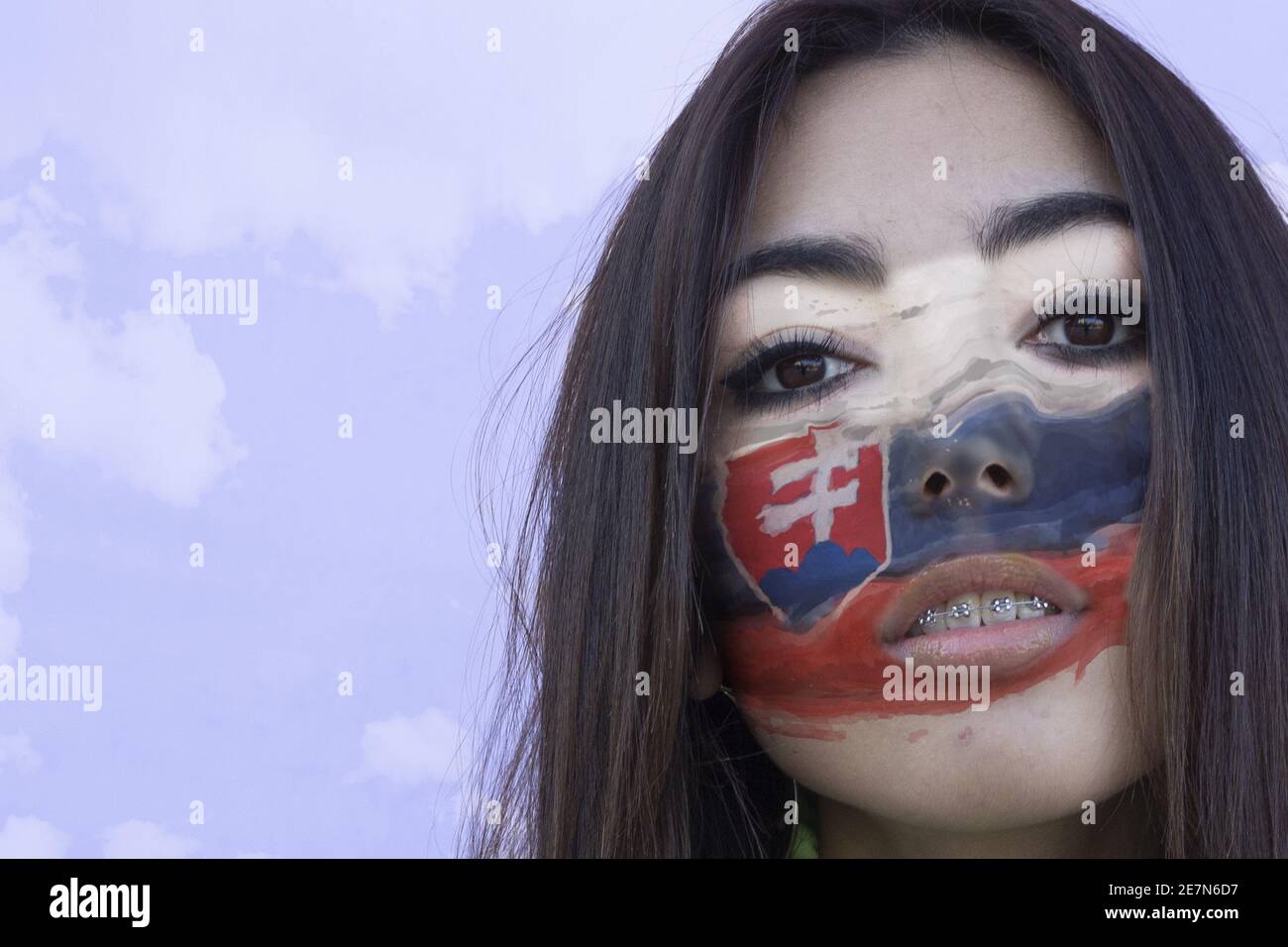Flag of Slovakia painted on a face of a young female Stock Photo - Alamy