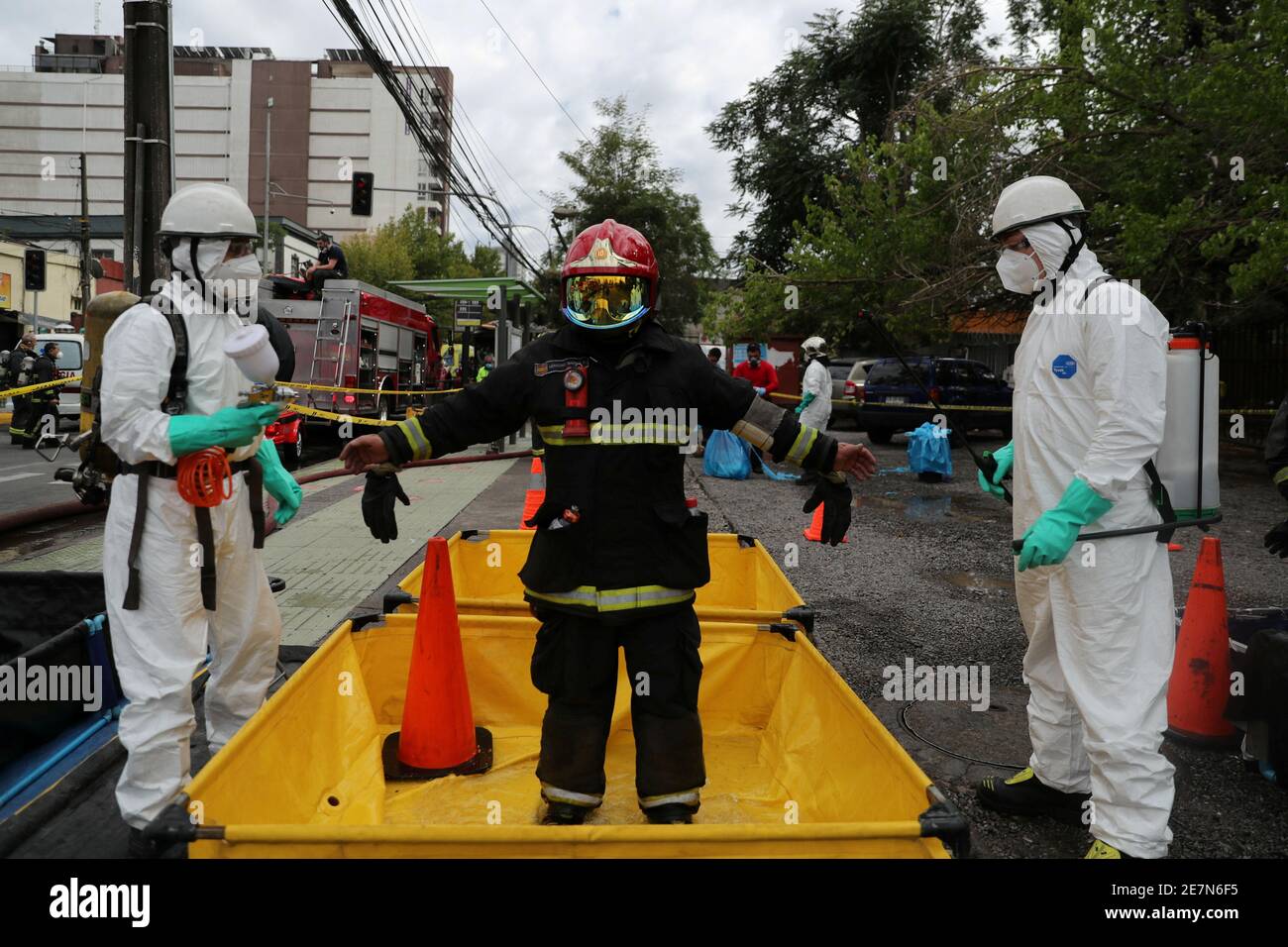 Firefighters spray disinfectant hi-res stock photography and images - Alamy